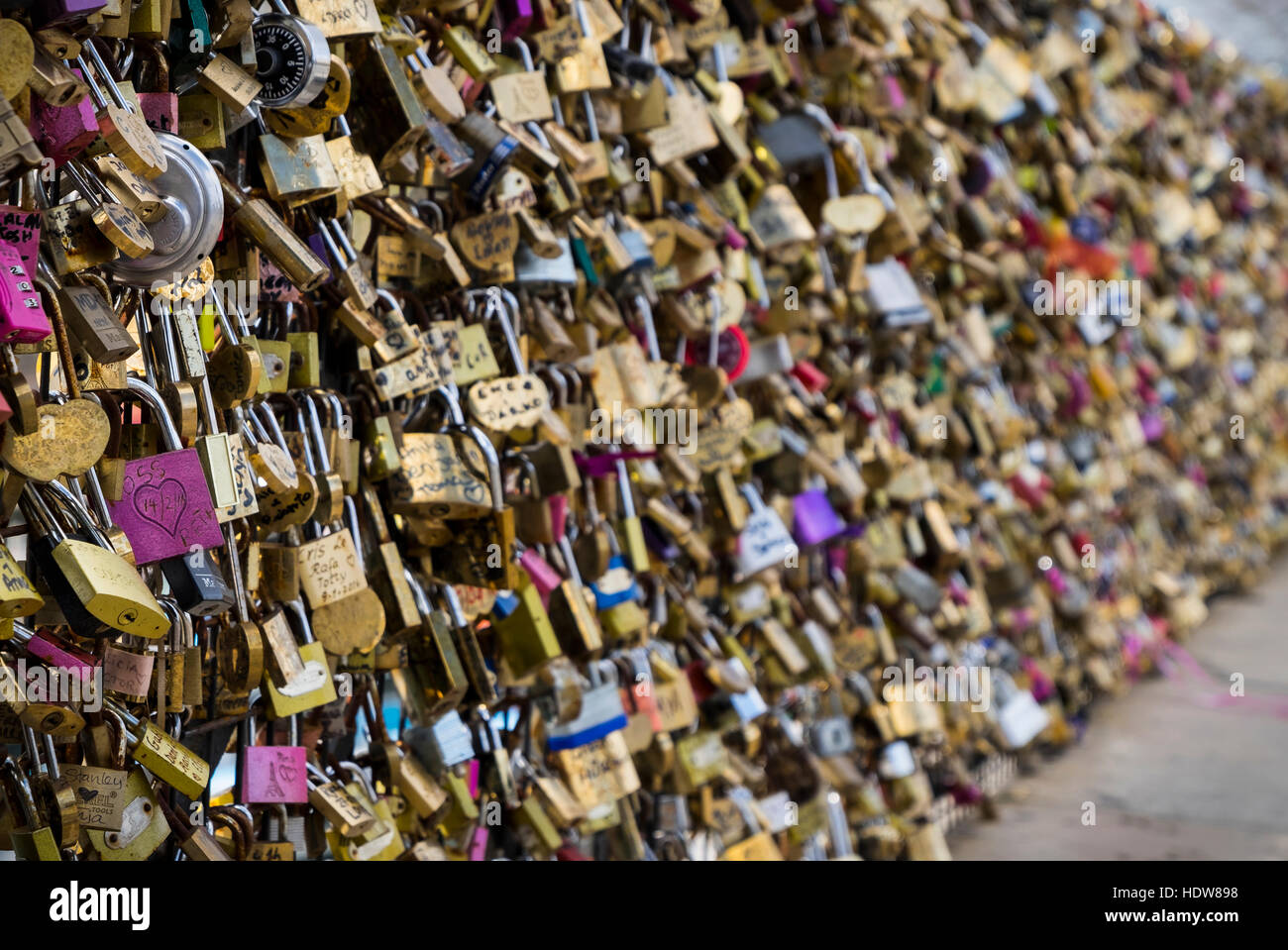 Love locks line a fence in the heart of Paris; Paris, France Stock ...