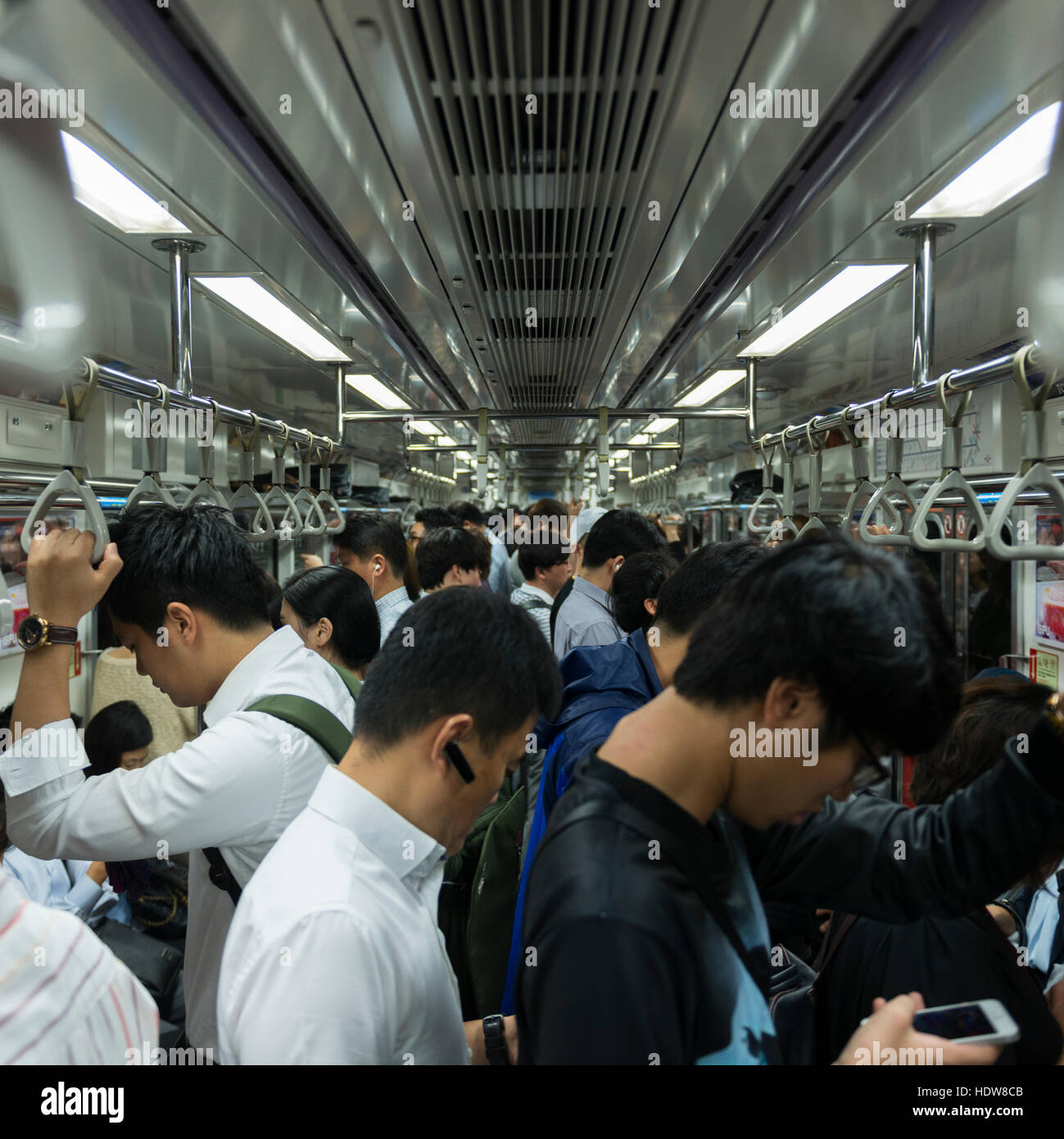 Commuters standing in a full subway train; Seoul, South Korea Stock ...