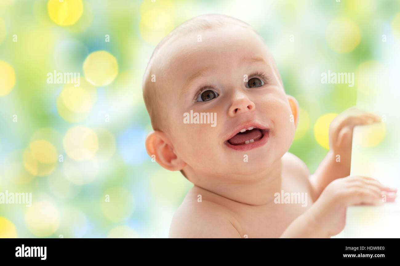 happy little baby boy or girl looking up Stock Photo - Alamy