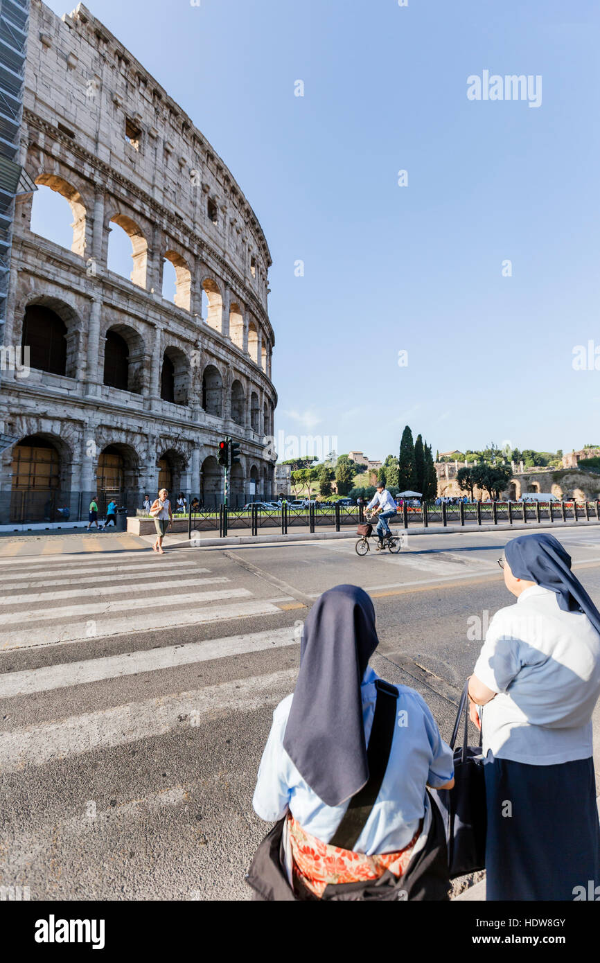A pair of Catholic nuns outside of Vatican city wait to cross the ...