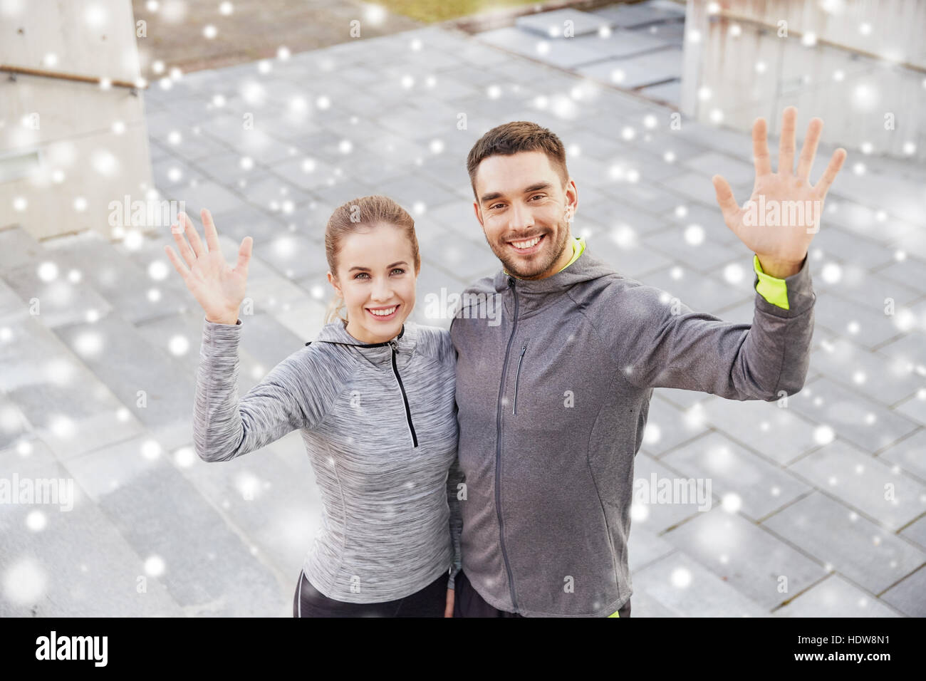 Two man hands waving hi-res stock photography and images - Alamy