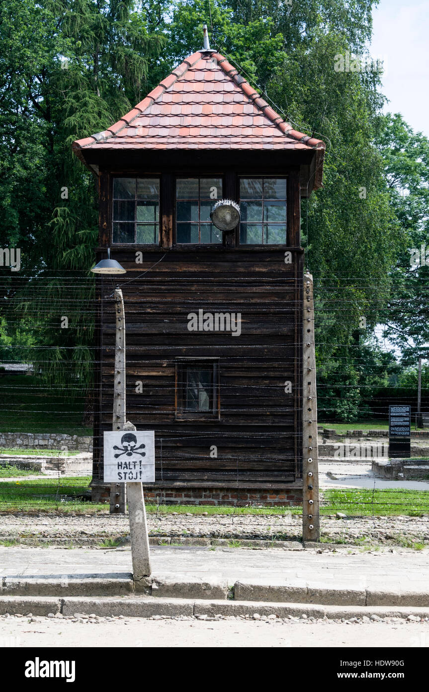 One of the surviving Nazi sentry guard towers and a warning sign ...