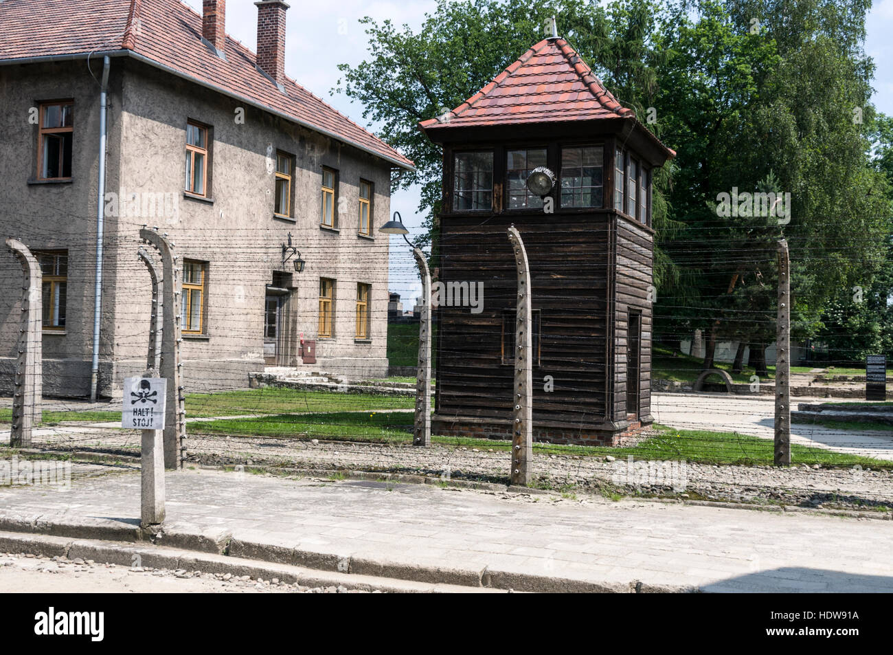 One of the surviving Nazi sentry guard towers and the warning sign with ...