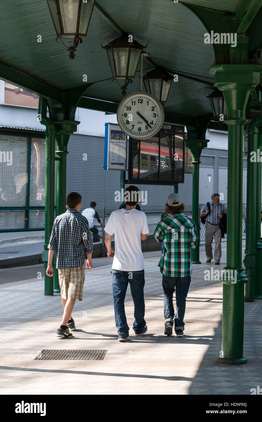 Train passengers making their way to catch trains at Krakow railway ...