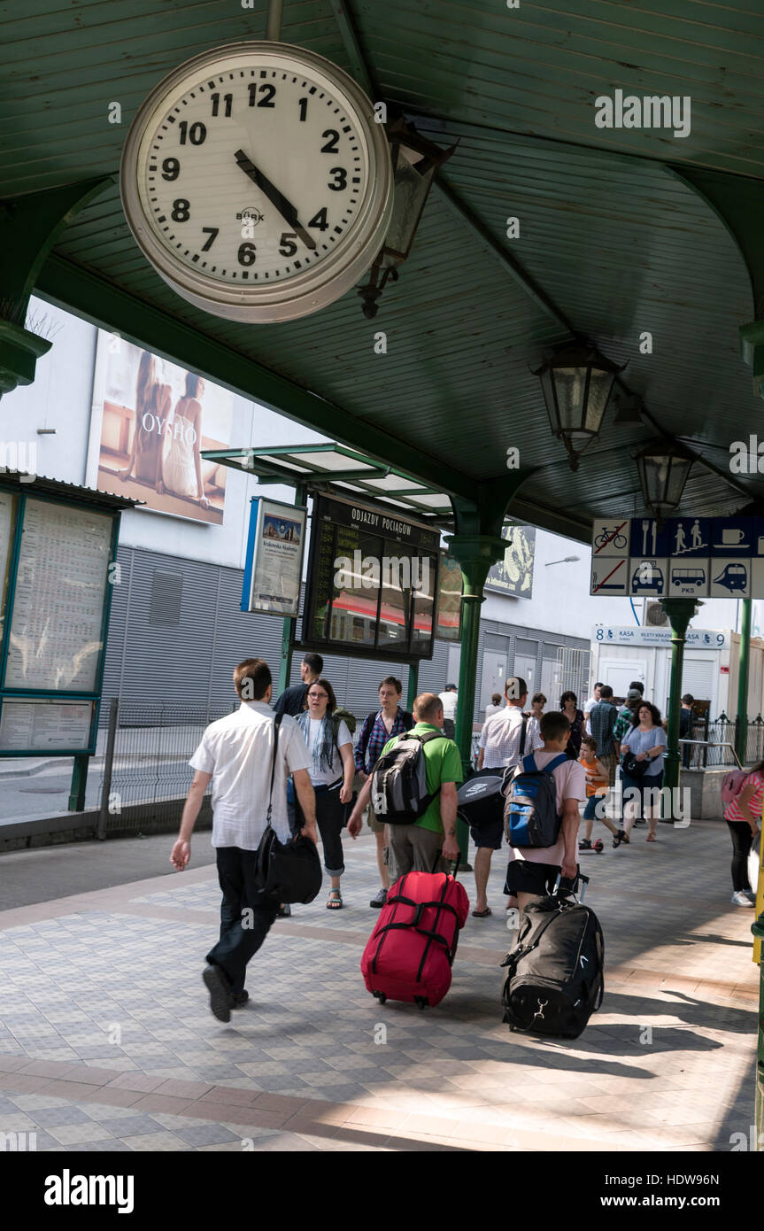 Train passengers making their way to catch trains at Krakow railway ...