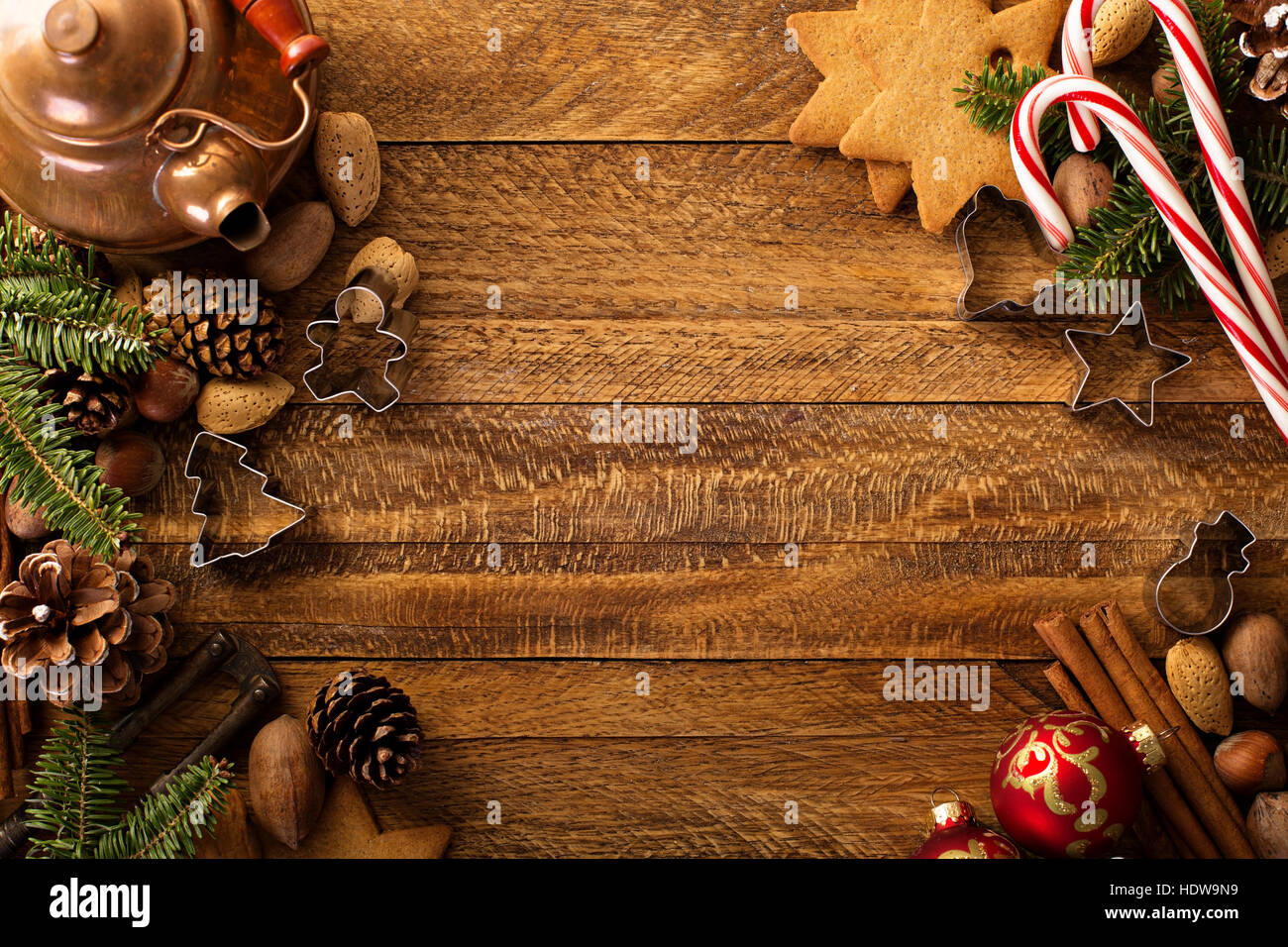 Christmas background with nuts, spices and pine tree Stock Photo - Alamy