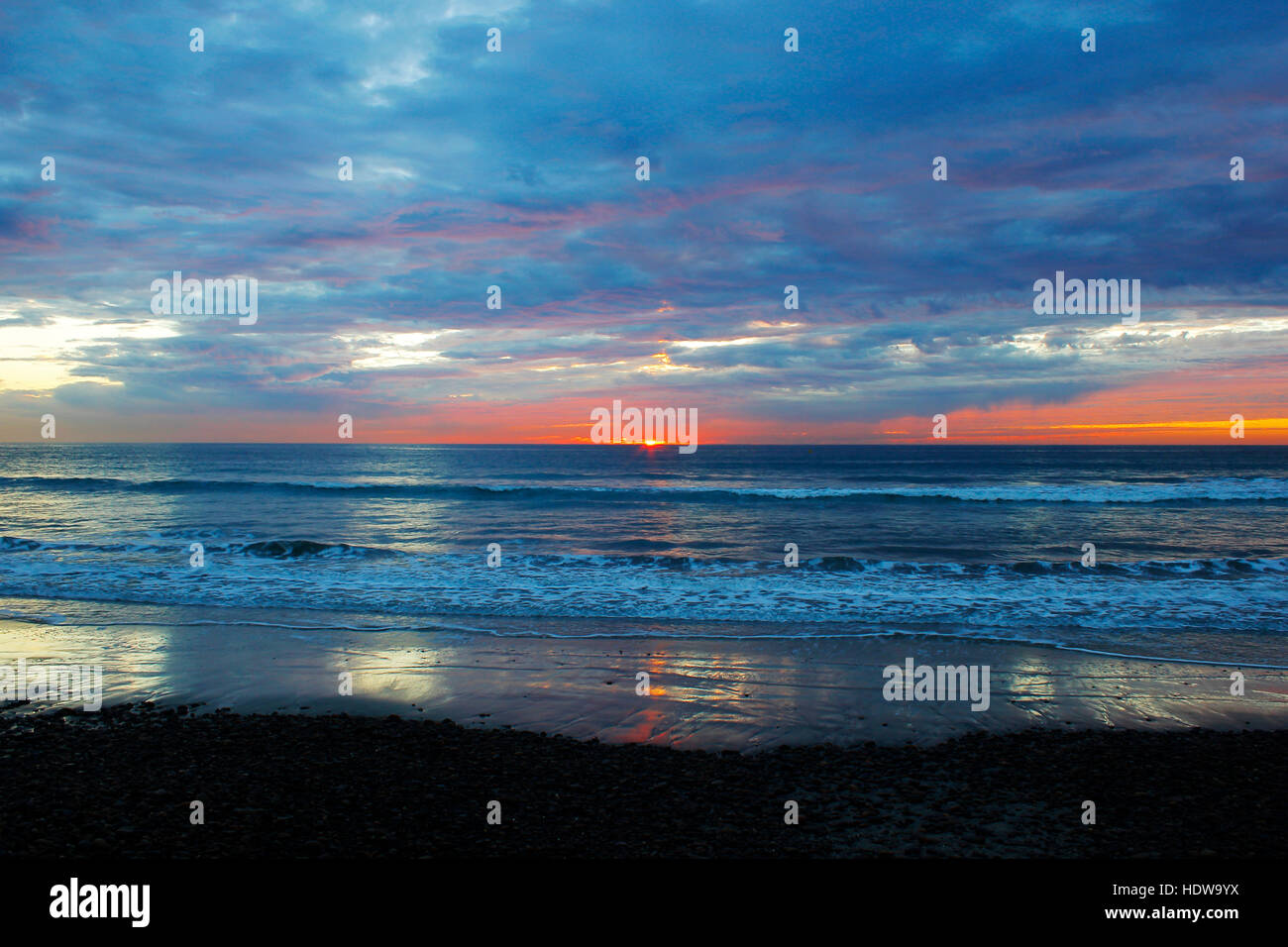 Stunning ocean sunset Stock Photo - Alamy