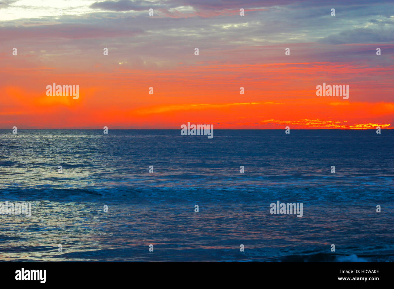 Stunning ocean sunset Stock Photo - Alamy