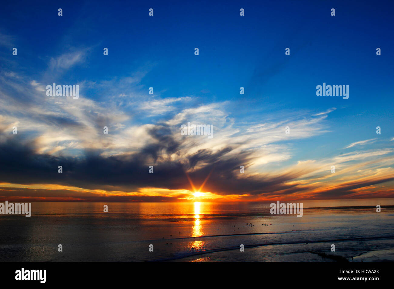 Stunning ocean sunset Stock Photo - Alamy
