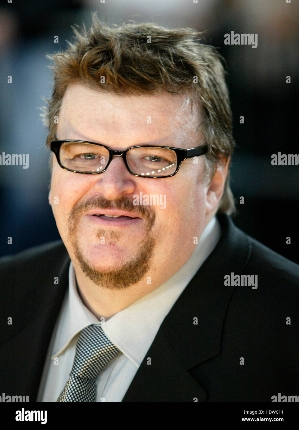 Director Michael Moore arrives at the People's Choice Awards in ...