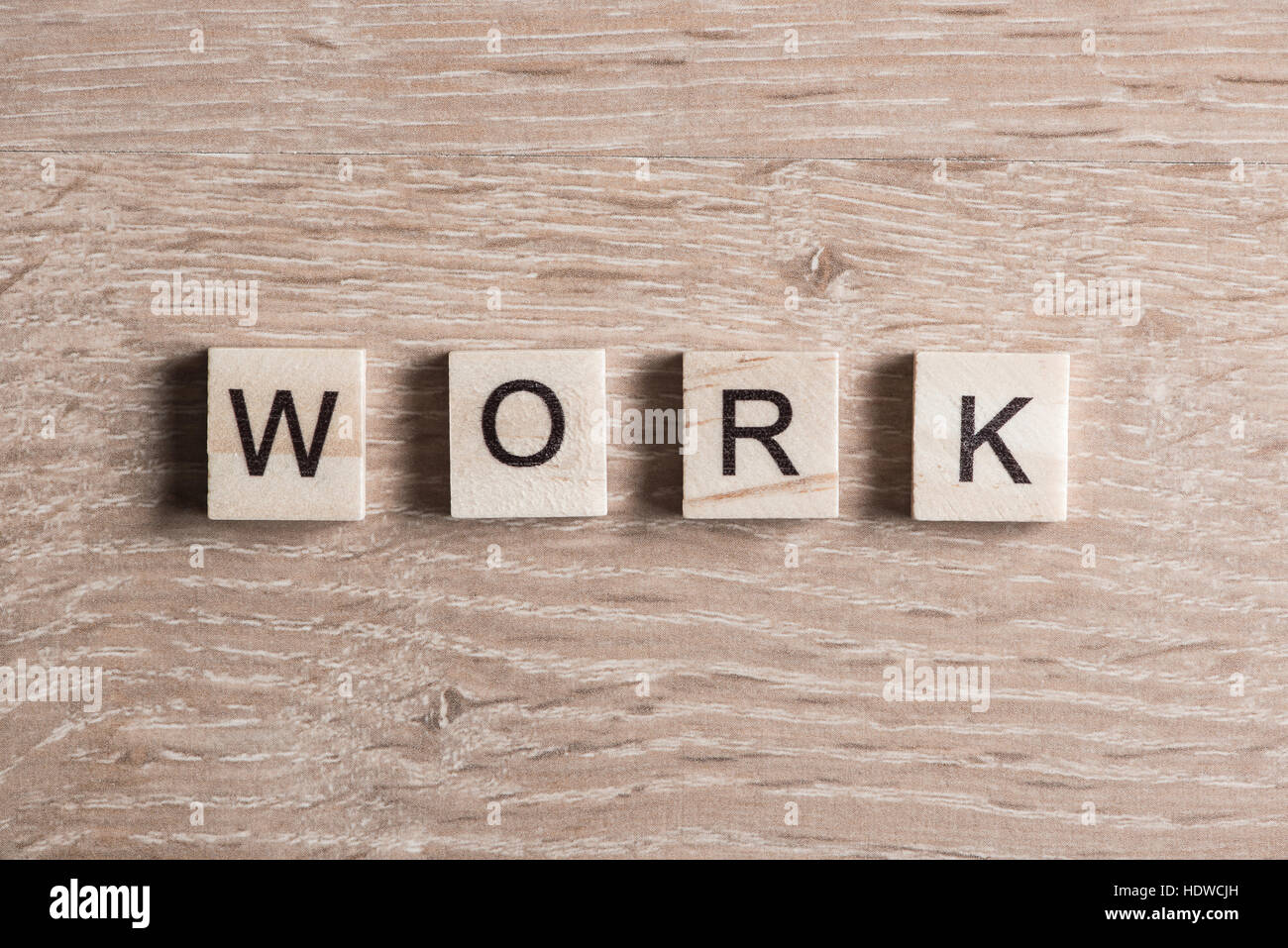 wooden elements with word work Stock Photo - Alamy