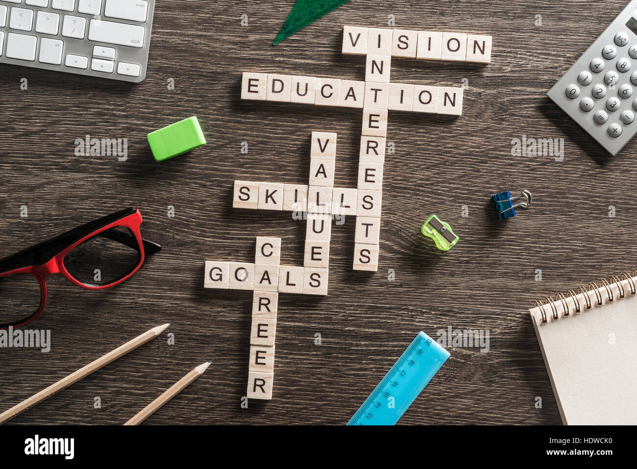 Conceptual business keywords on table with elements of game making ...