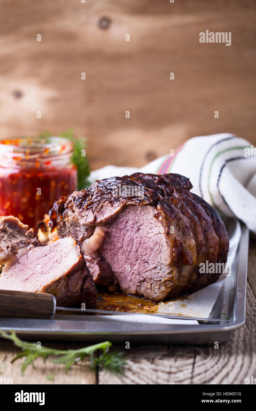 Homemade rib-eye boneless roast beef with stuffed mushrooms on baking ...