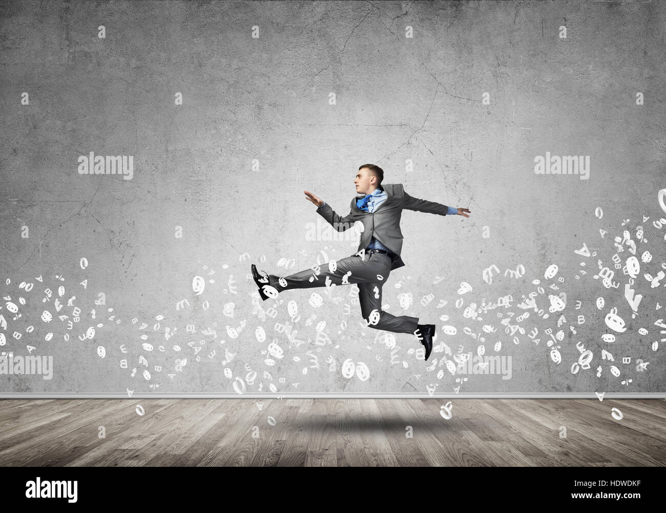 Businessman jumping high Stock Photo - Alamy