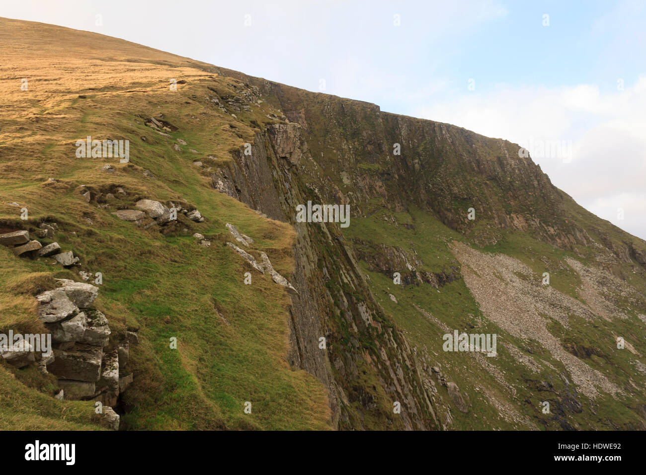 Sea cliffs with rock faces and scree slopes, on the north coast of the ...