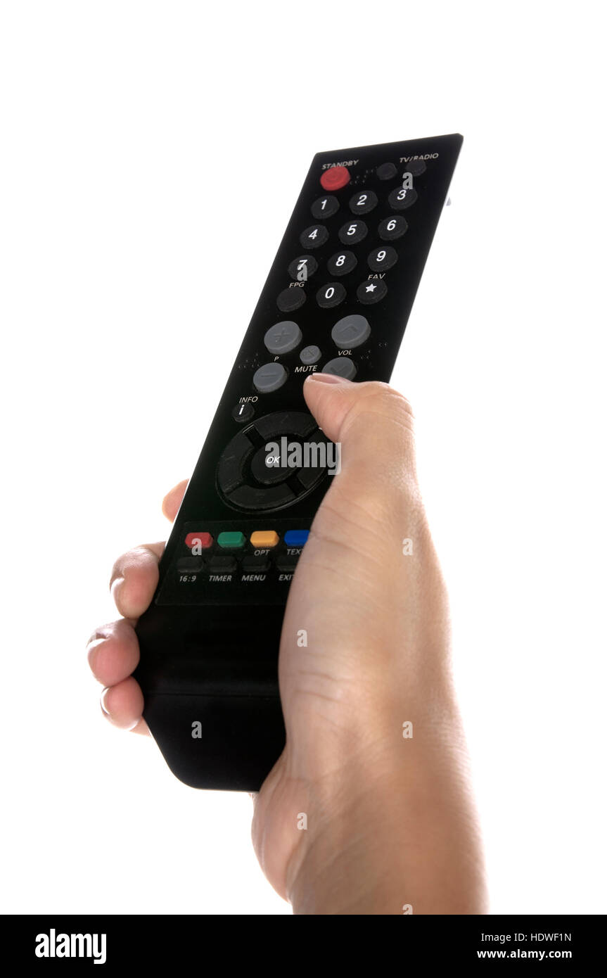 Woman holding remote control television isolated over white background ...