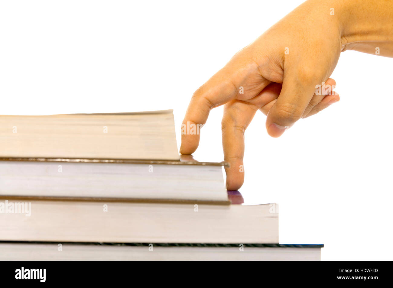 Hand and book stairs isolated on white background Stock Photo - Alamy