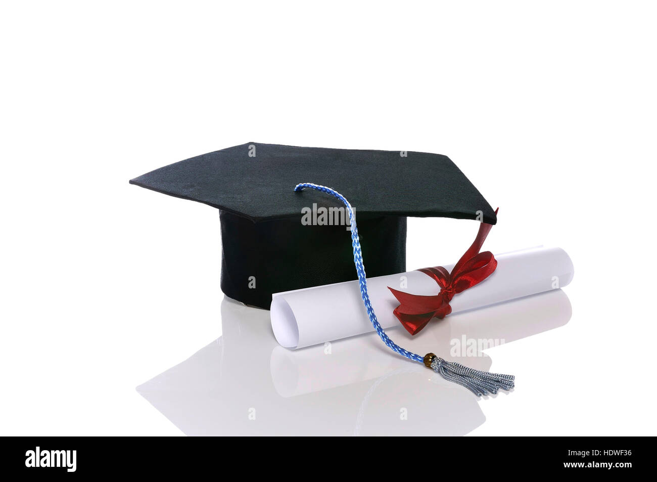 Graduation cap and scroll isolated over white background Stock Photo ...
