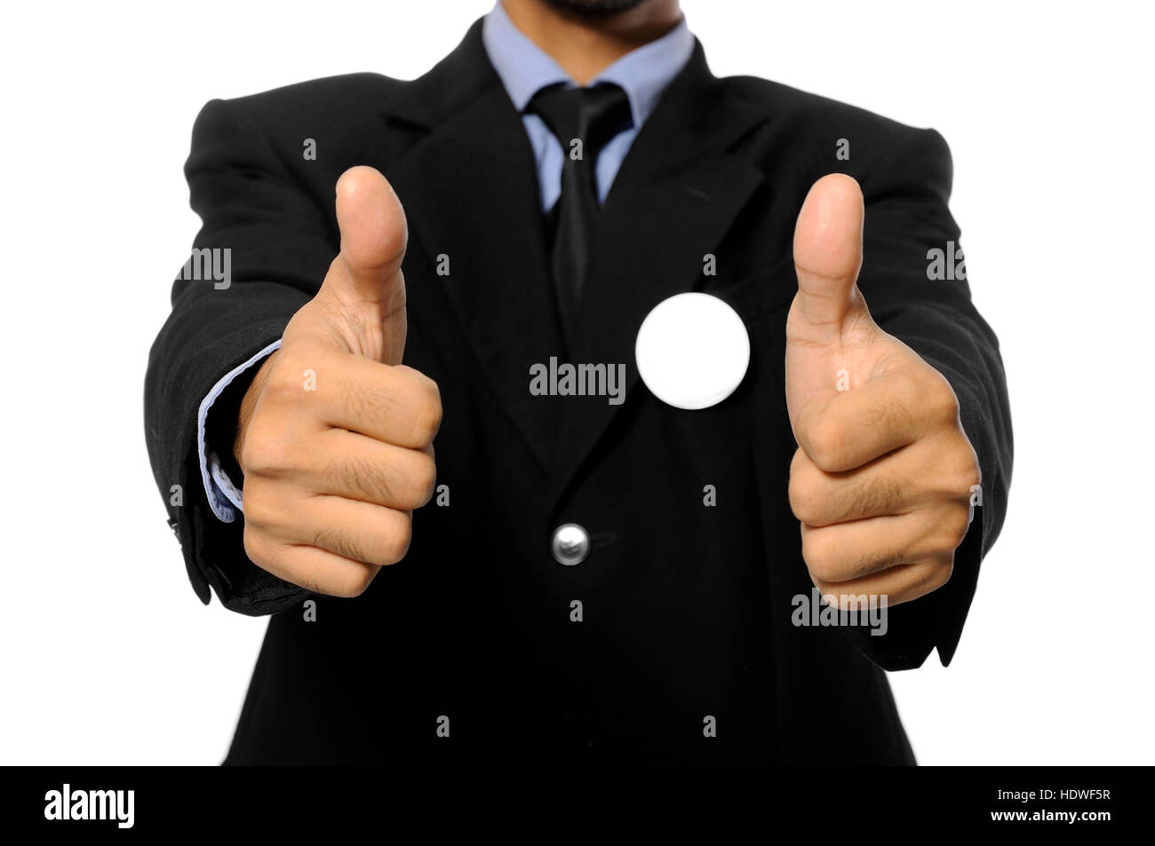 Man with black business suit with blank pinned button give thumb up ...