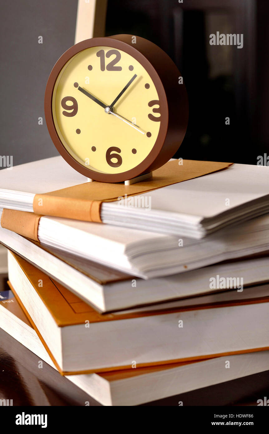 Time clock watch textbook hi-res stock photography and images - Alamy