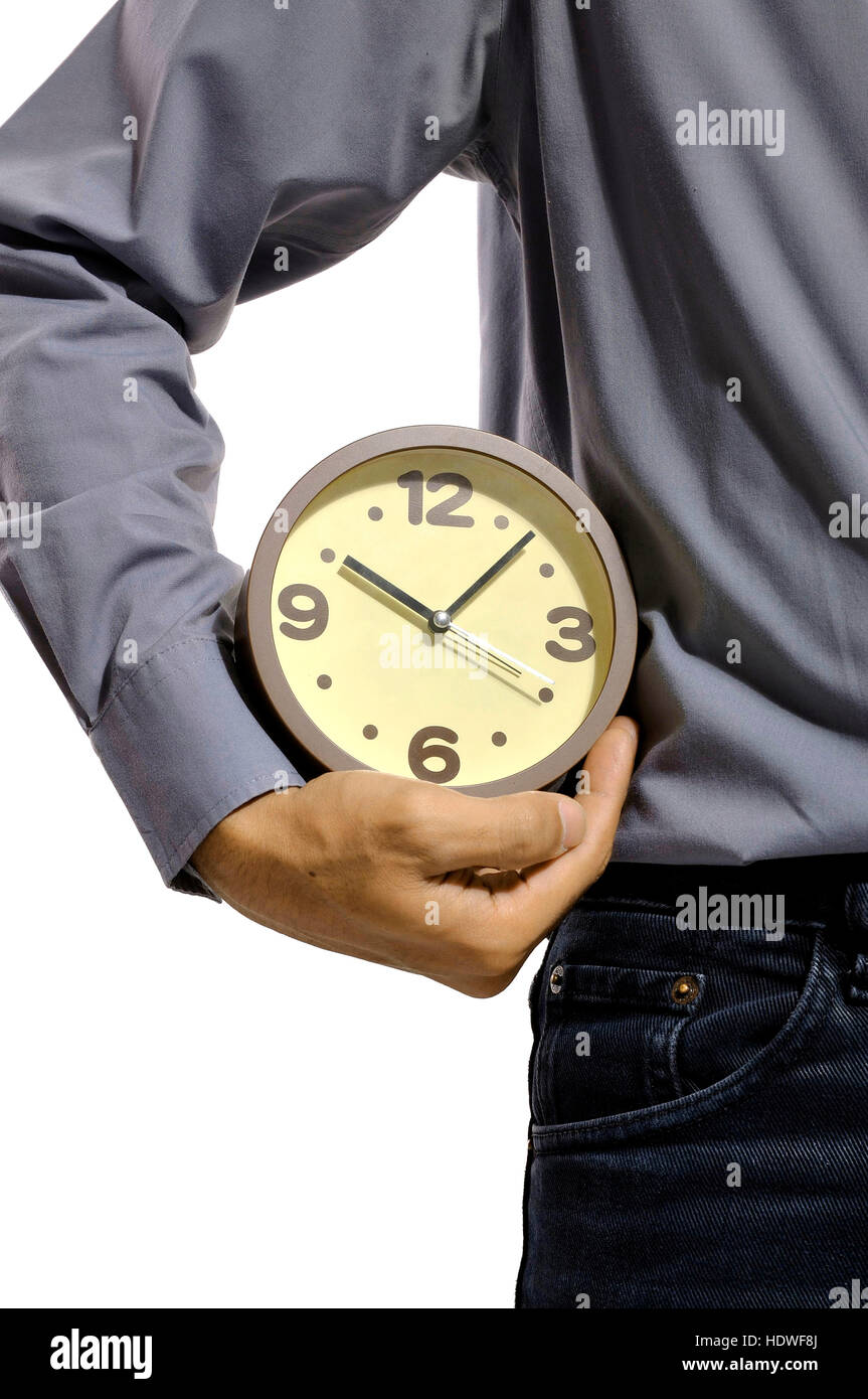 Businessman holding clock in his hand isolated over white background ...