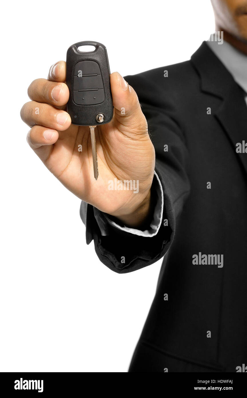 Business man give car key isolated over white background Stock Photo ...