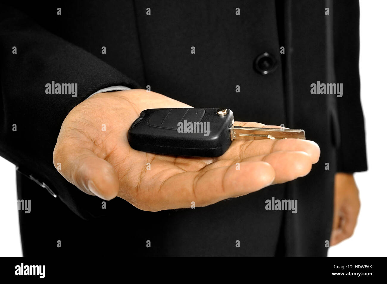 Business man give car key isolated over white background Stock Photo ...