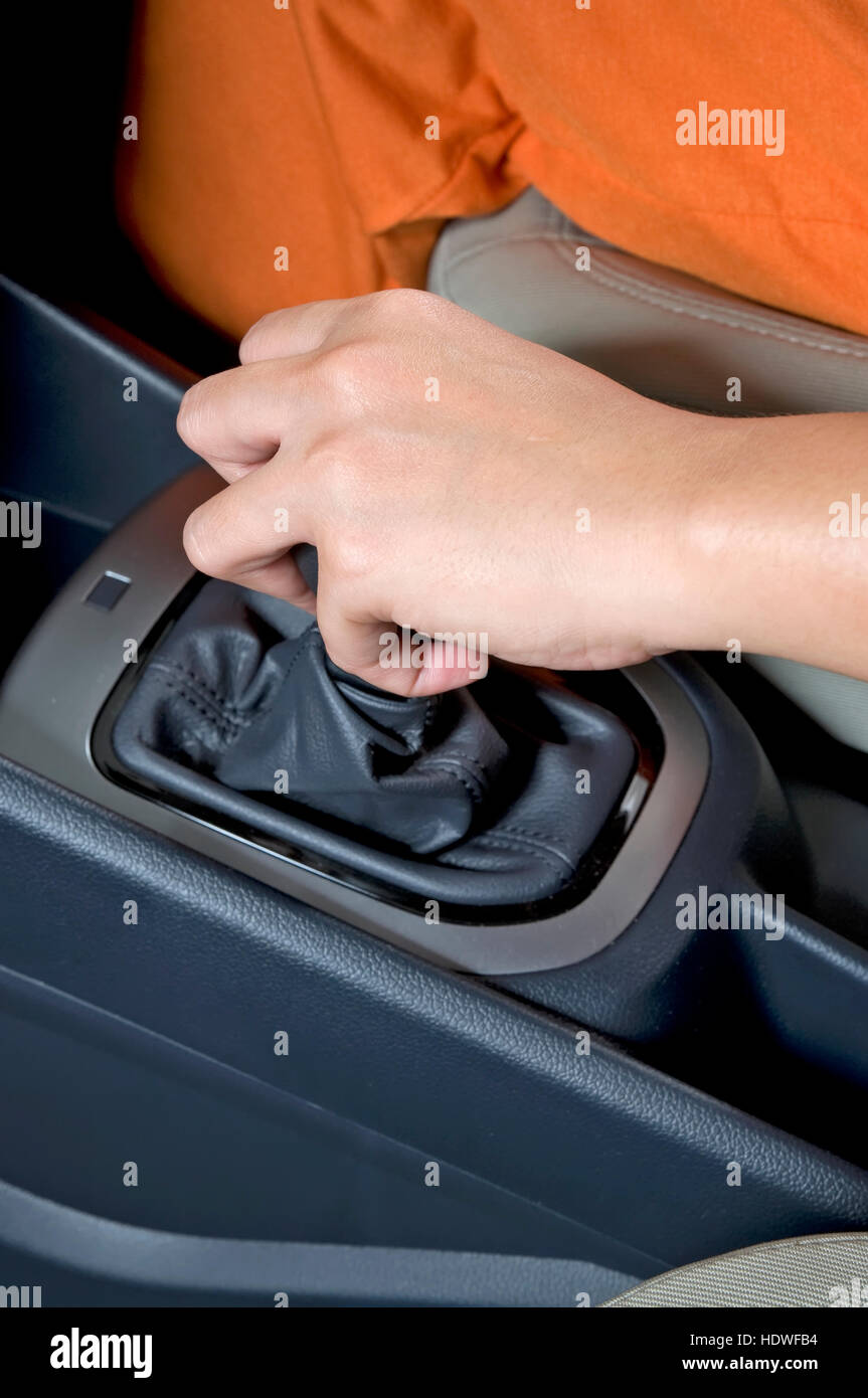 Woman driver shift automatic transmission with her hand Stock Photo - Alamy