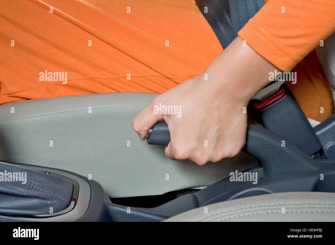 Woman hand pull hand brake of a car Stock Photo - Alamy