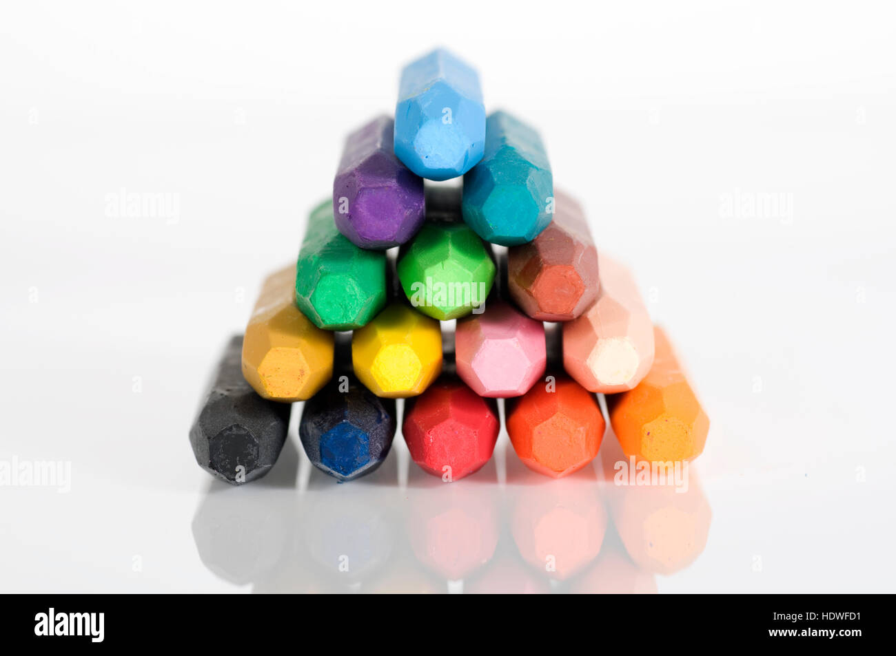 Group of crayons stacked on white background Stock Photo - Alamy