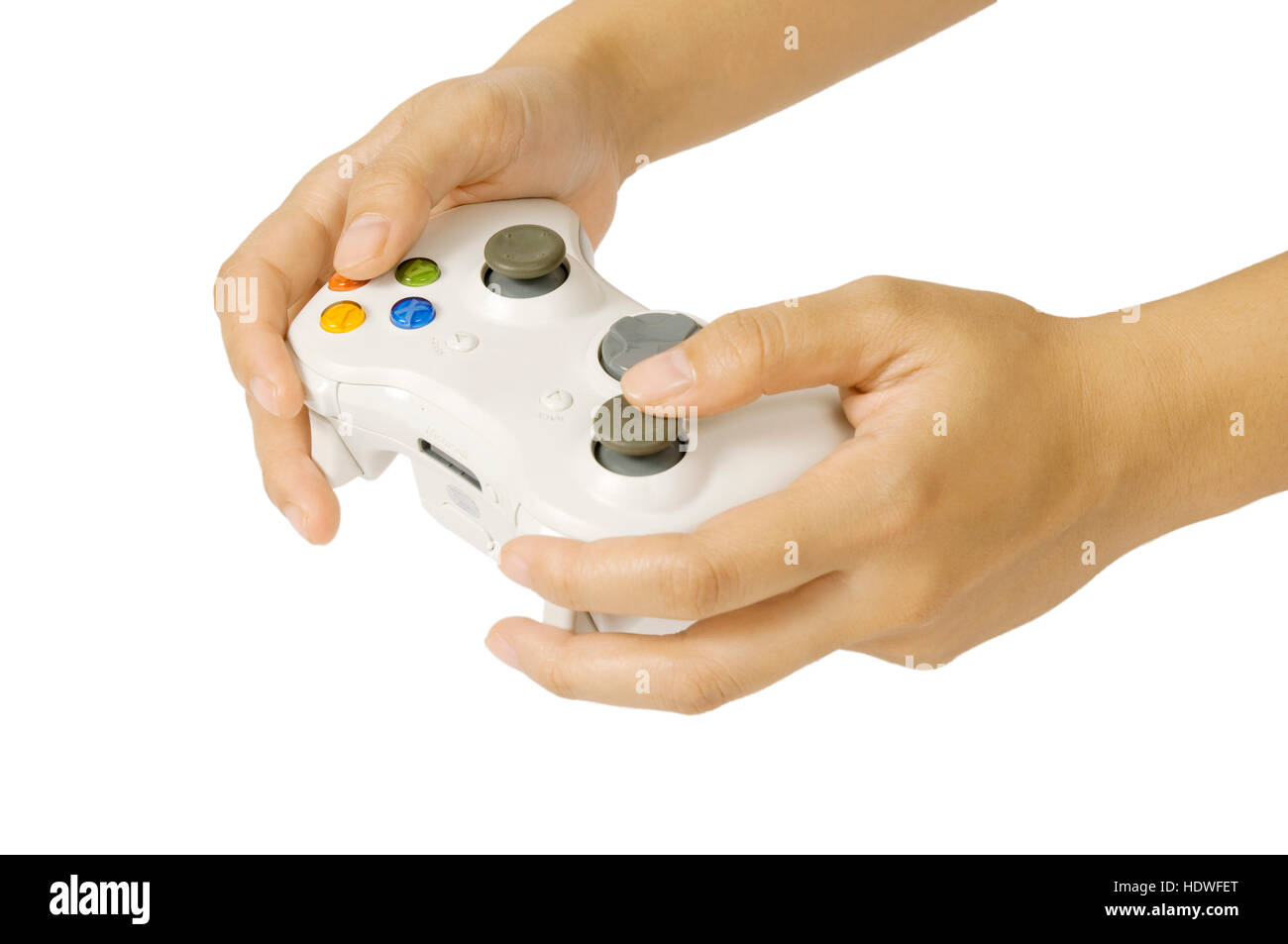 Gamepad hold by human hand isolated over white background Stock Photo ...
