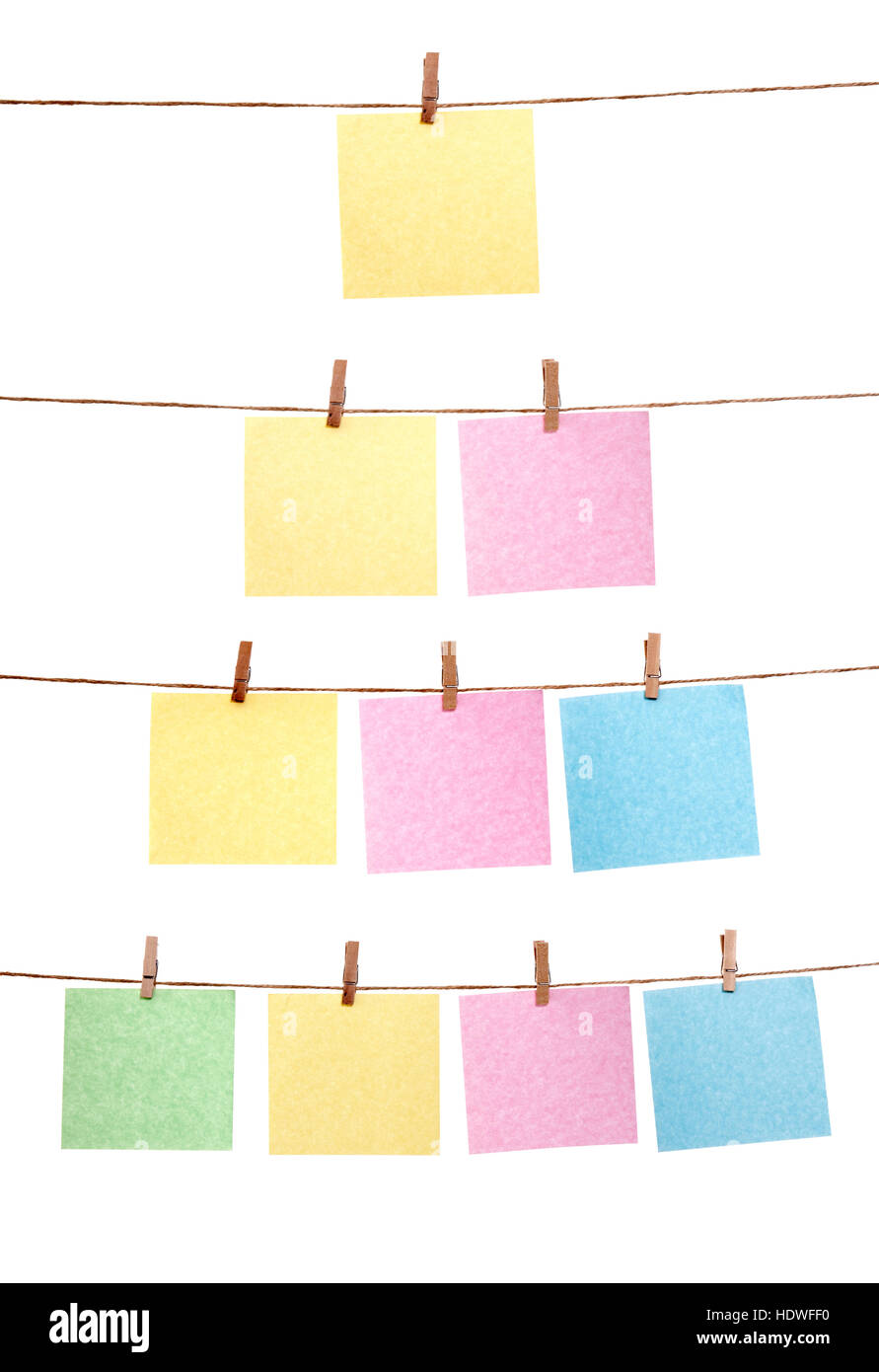 Collection of paper note hanging on the rope isolated over white ...