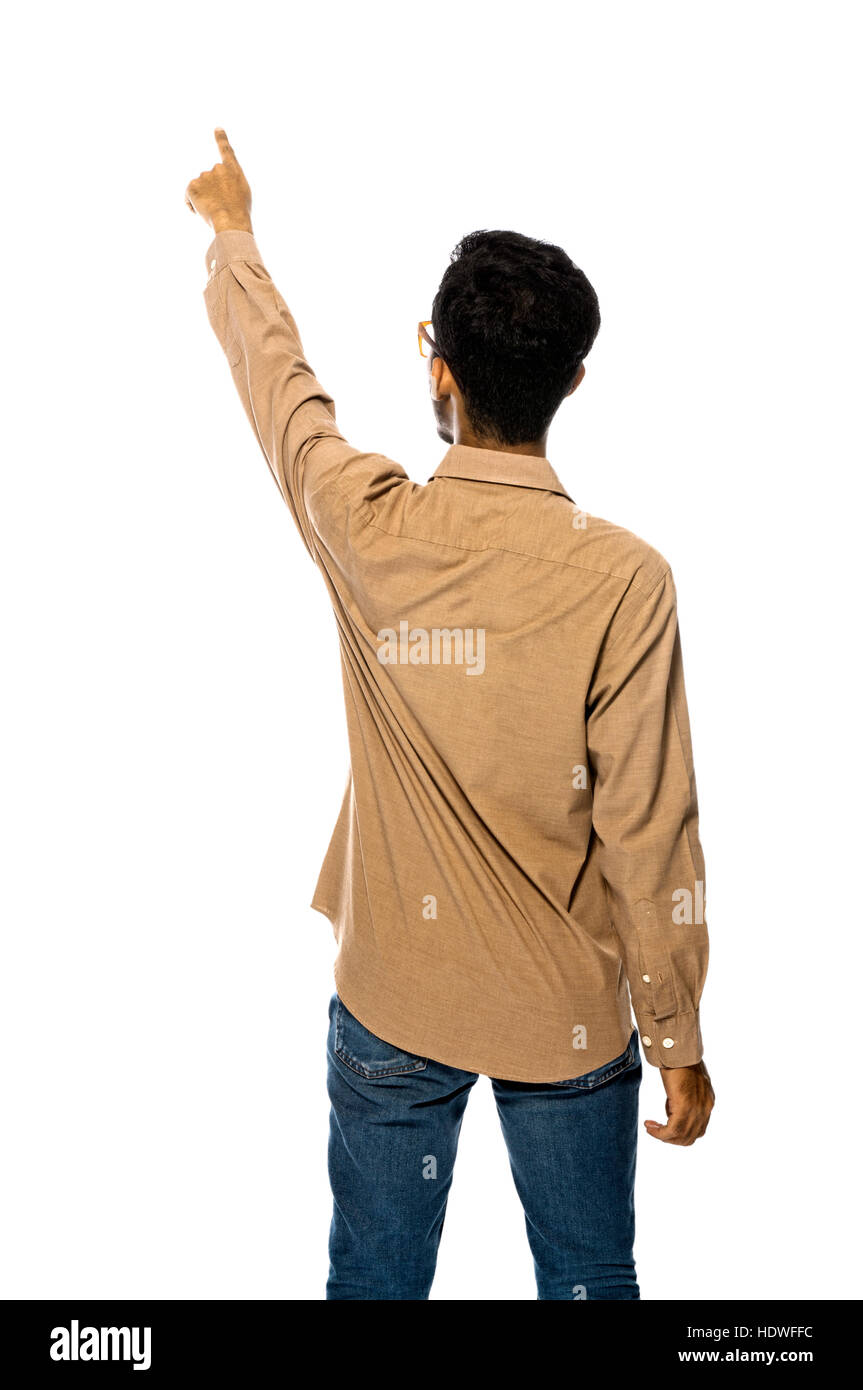 Asian business man pointing something from back isolated over white ...