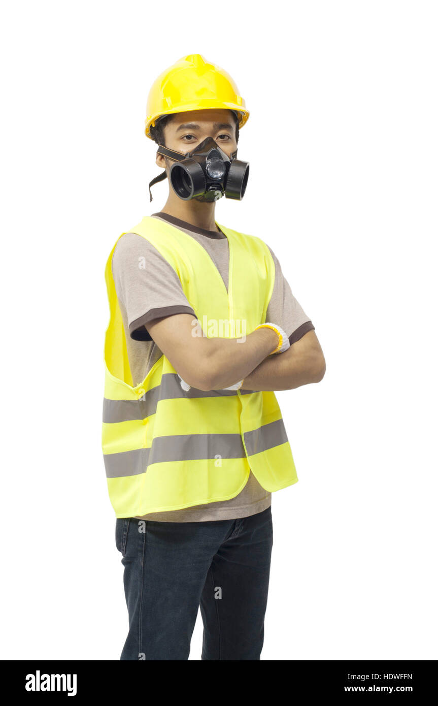 Worker wearing work gear isolated over white background Stock Photo - Alamy