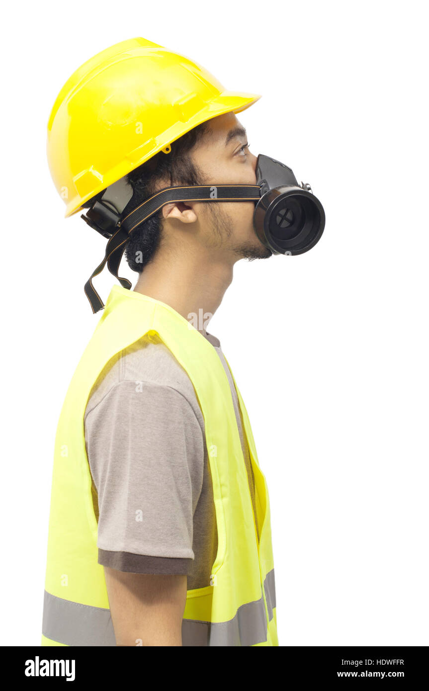 Worker wearing work gear looking up isolated over white background ...
