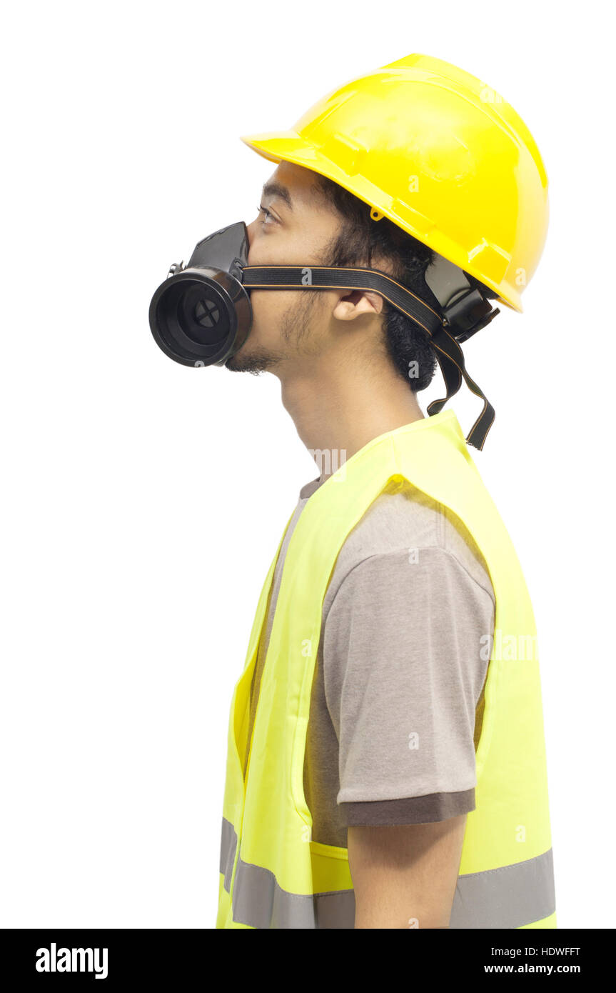 Worker wearing work gear looking up isolated over white background ...