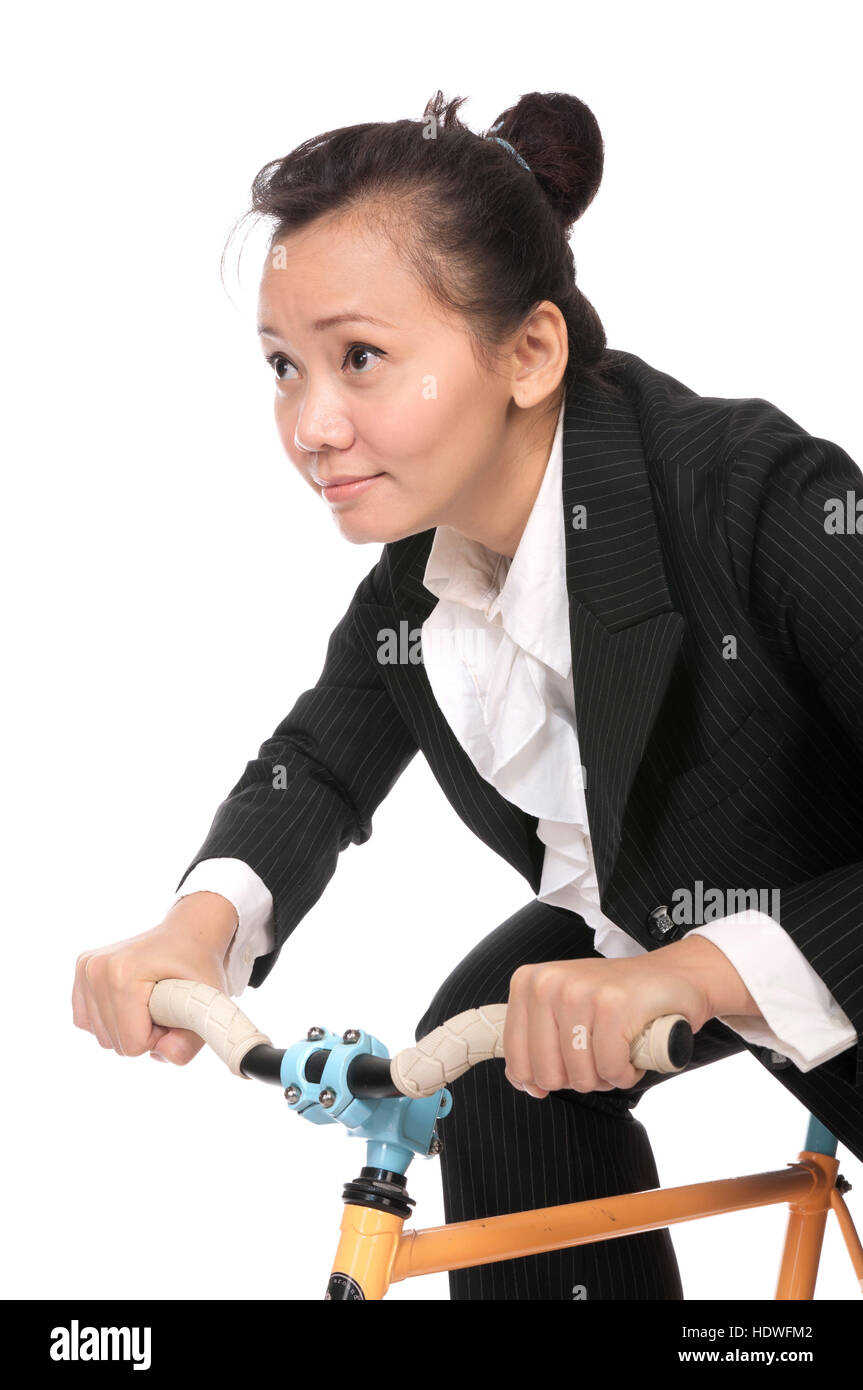 Business woman riding bicycle isolated over white background Stock ...