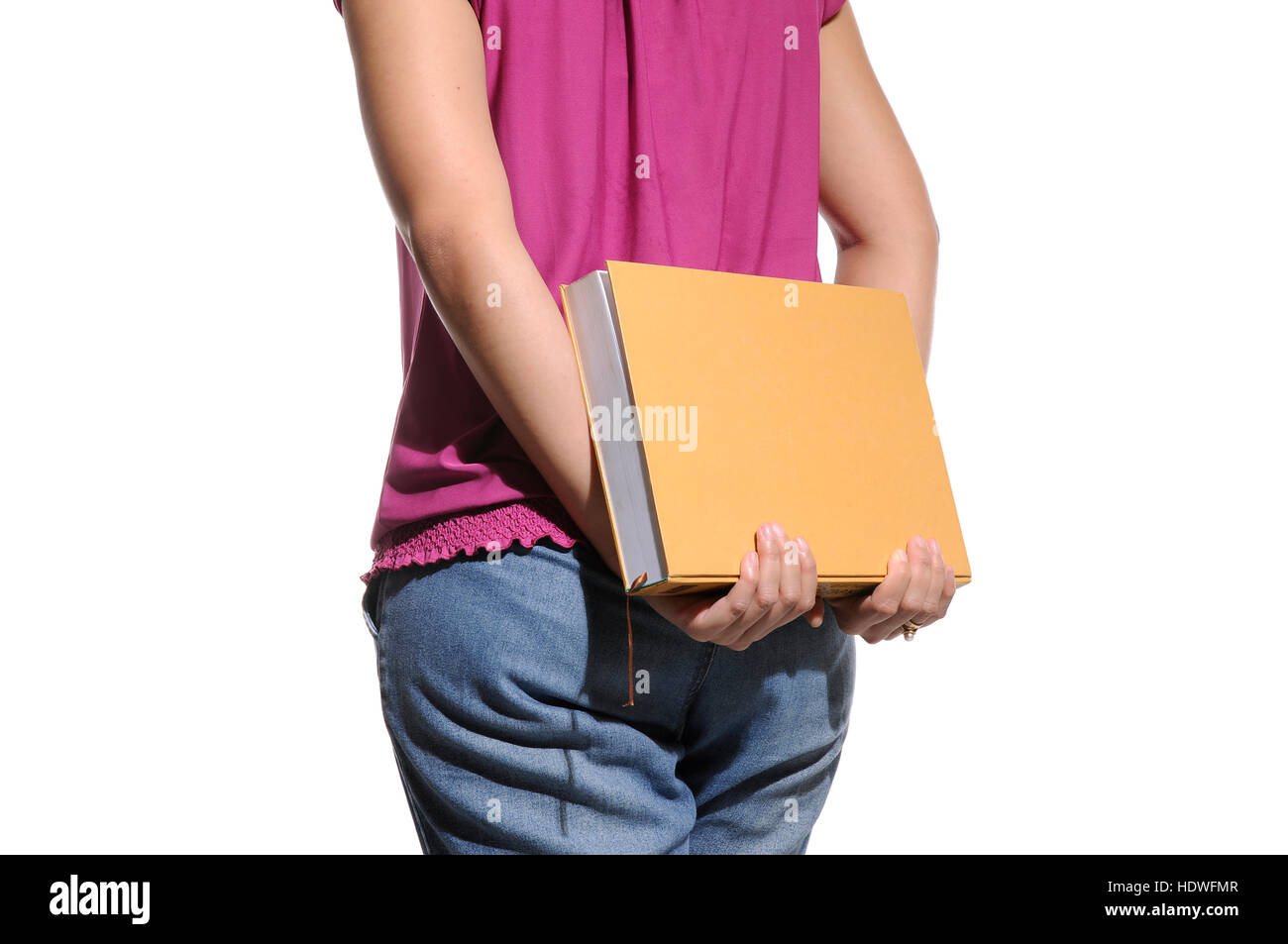 Woman bring book with her hand isolated over white background Stock ...