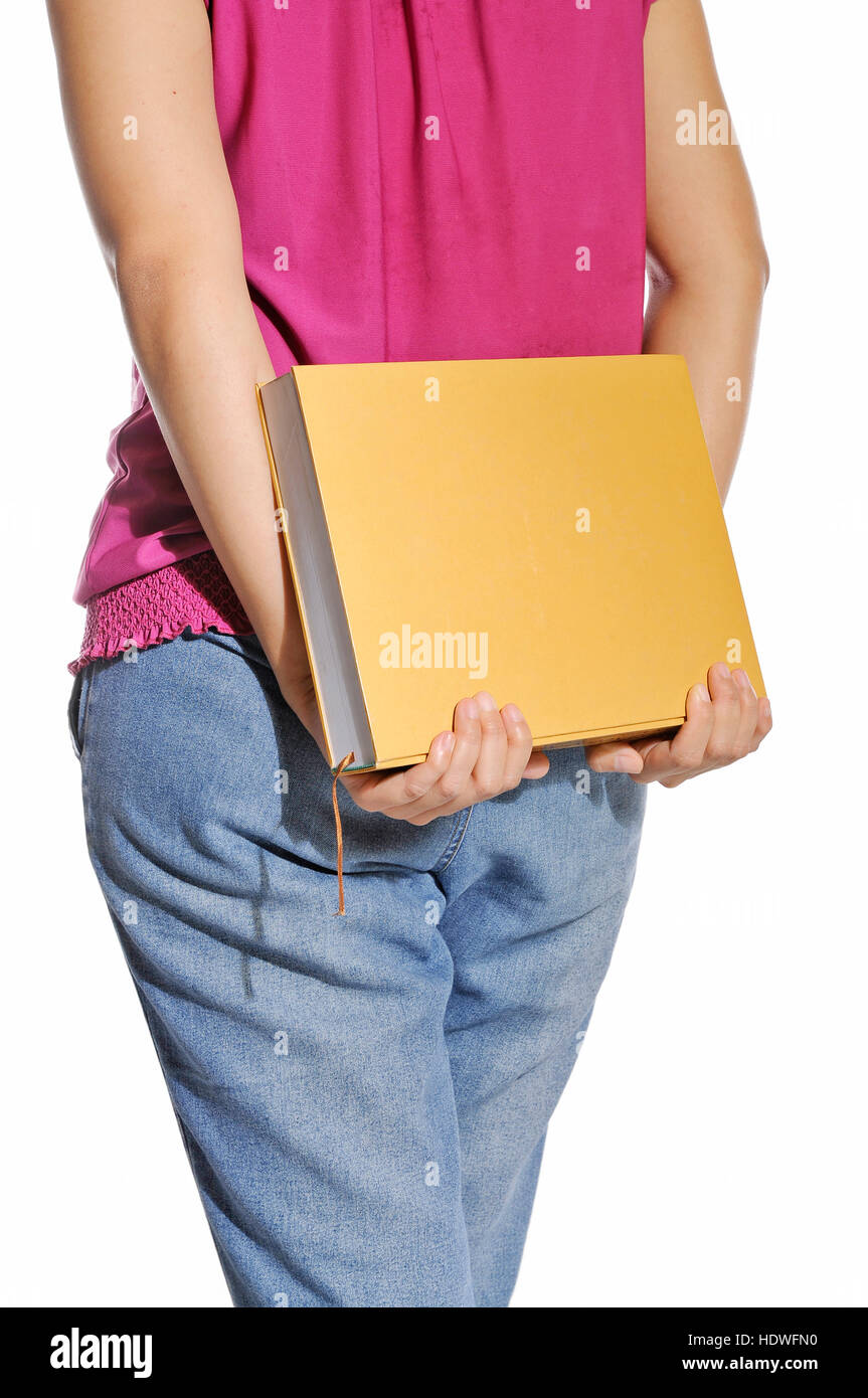 Woman bring book with her hand isolated over white background Stock ...