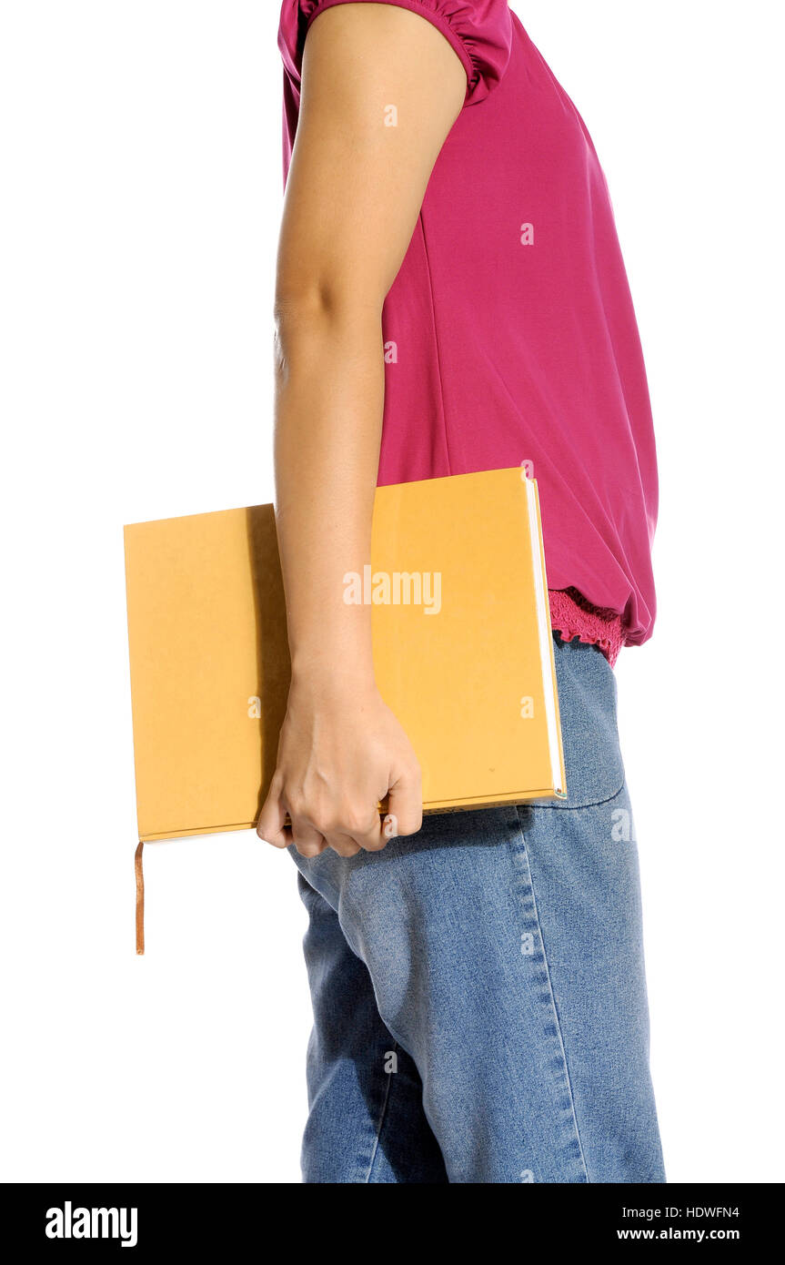 Woman bring book with her hand isolated over white background Stock ...