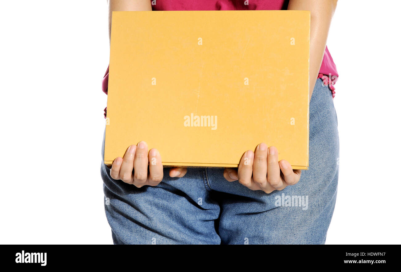 Woman bring book with her hand isolated over white background Stock ...