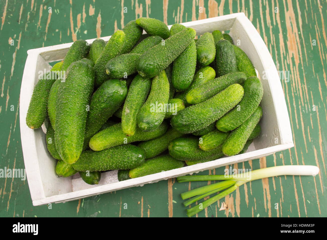Fresh raw cucumbers in a wooden box Stock Photo - Alamy
