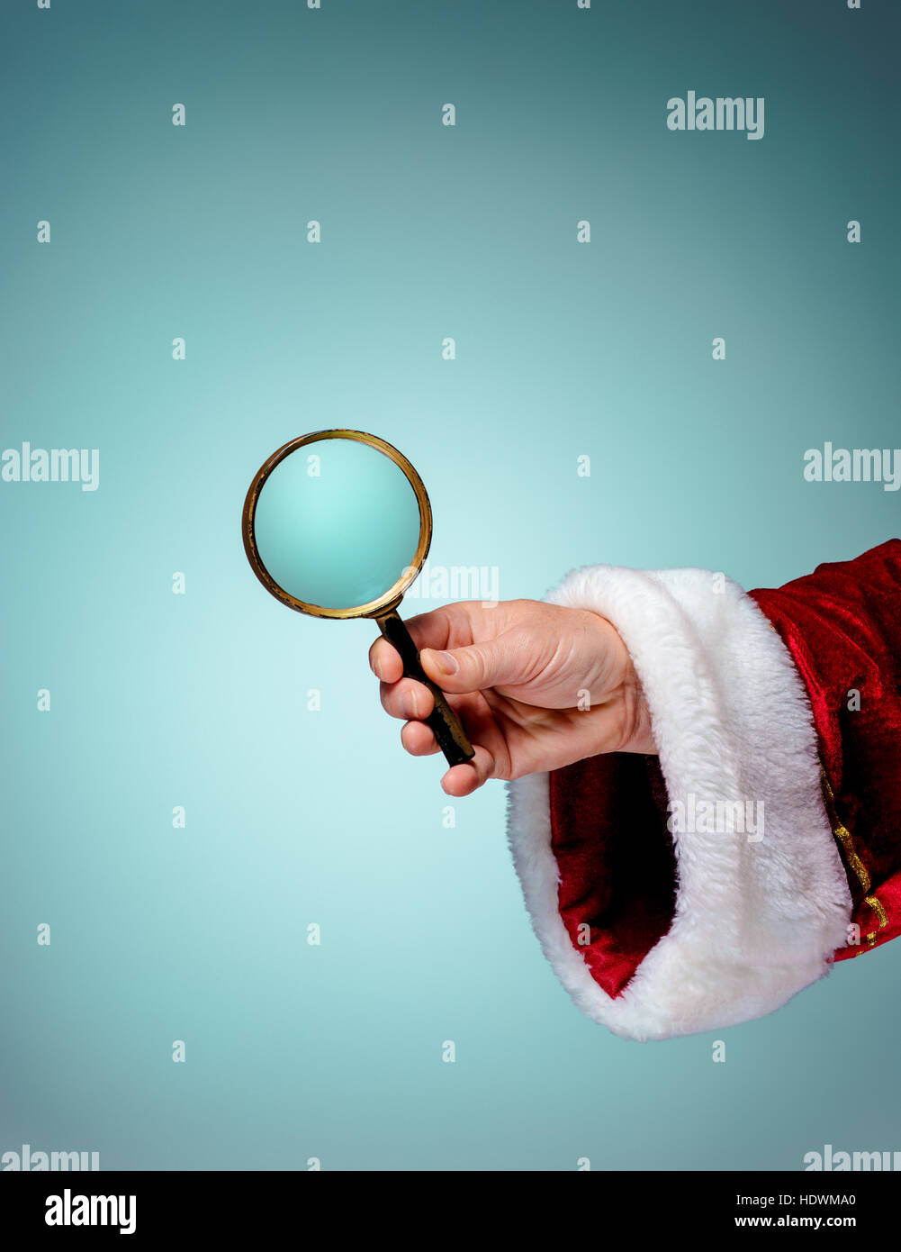 Santa claus with magnifying glass hi-res stock photography and images ...
