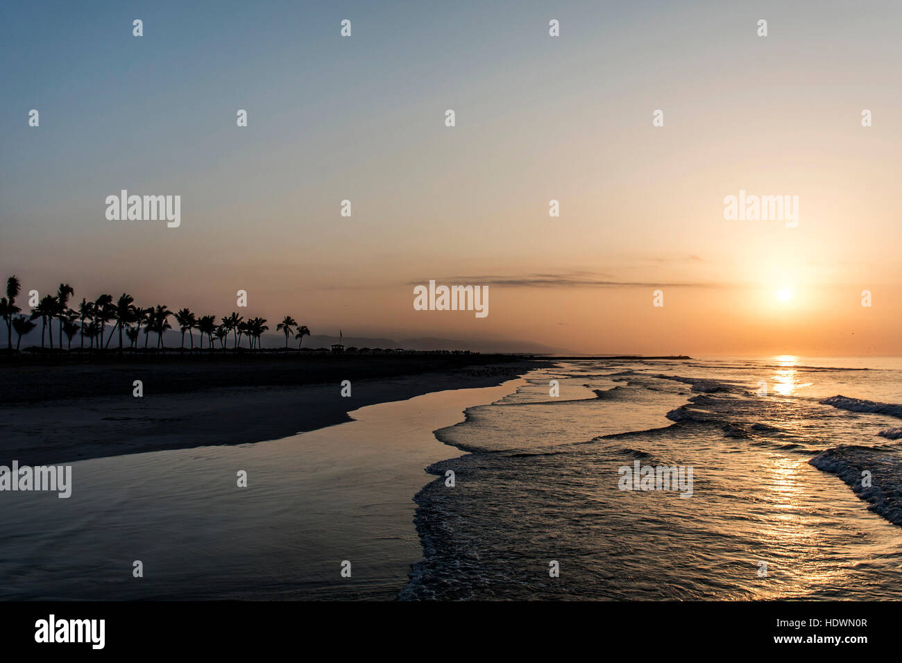 Amazing Sunset red sky waves at the beach in Salalah Oman 13 Stock ...