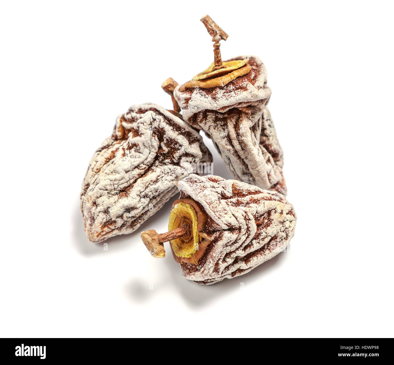 Several of dried persimmon fruit on a white background Stock Photo - Alamy