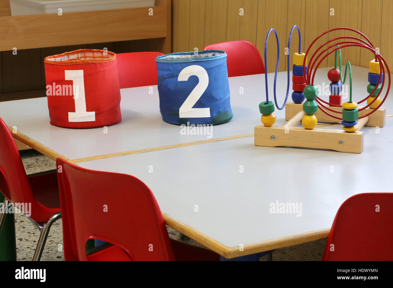 two bug jars with the written one and two in the kindergarten Stock ...