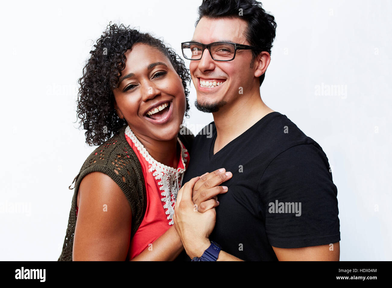 Smiling couple hugging Stock Photo - Alamy