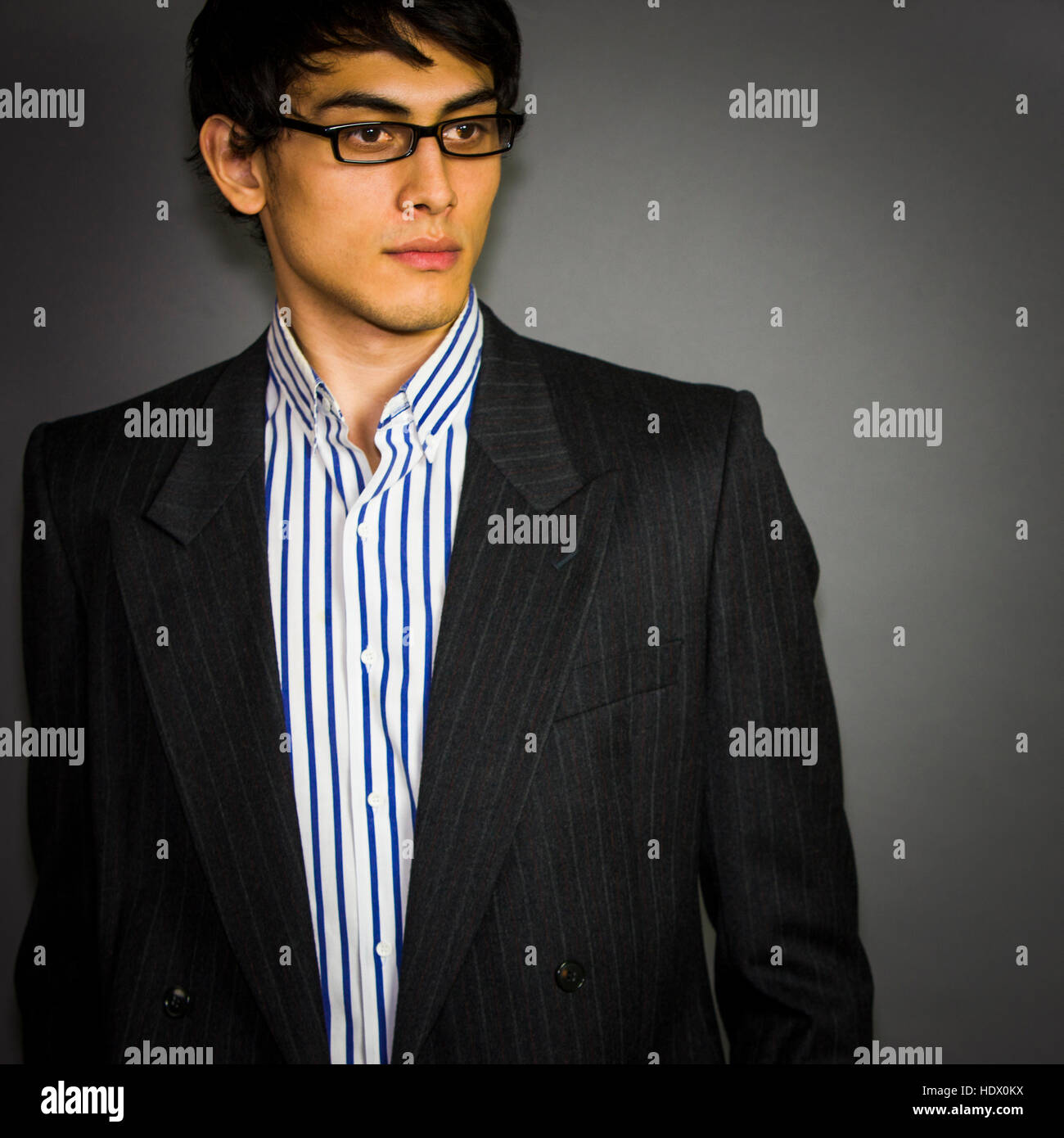 Serious Mixed Race businessman Stock Photo - Alamy