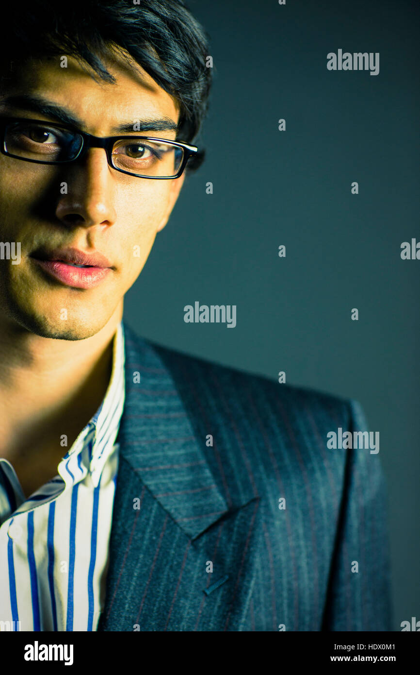 Portrait of serious Mixed Race businessman Stock Photo - Alamy