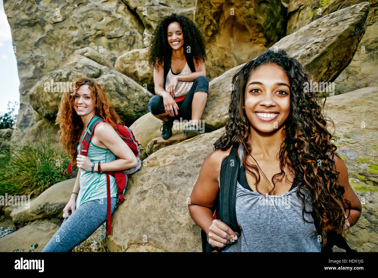 Woman carrying rock on her head hi-res stock photography and images - Alamy